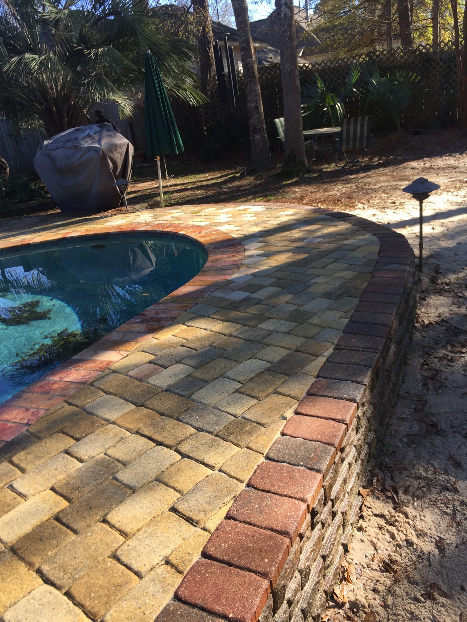 Paver around pool - Dino's Masonry