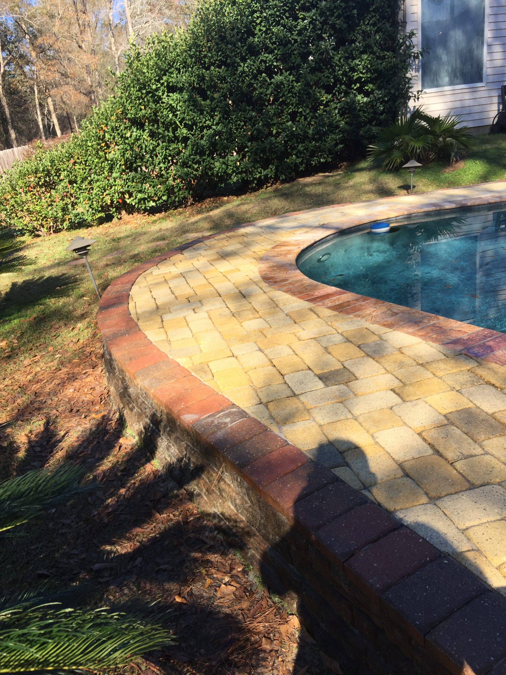 Paver around pool - Dino's Masonry